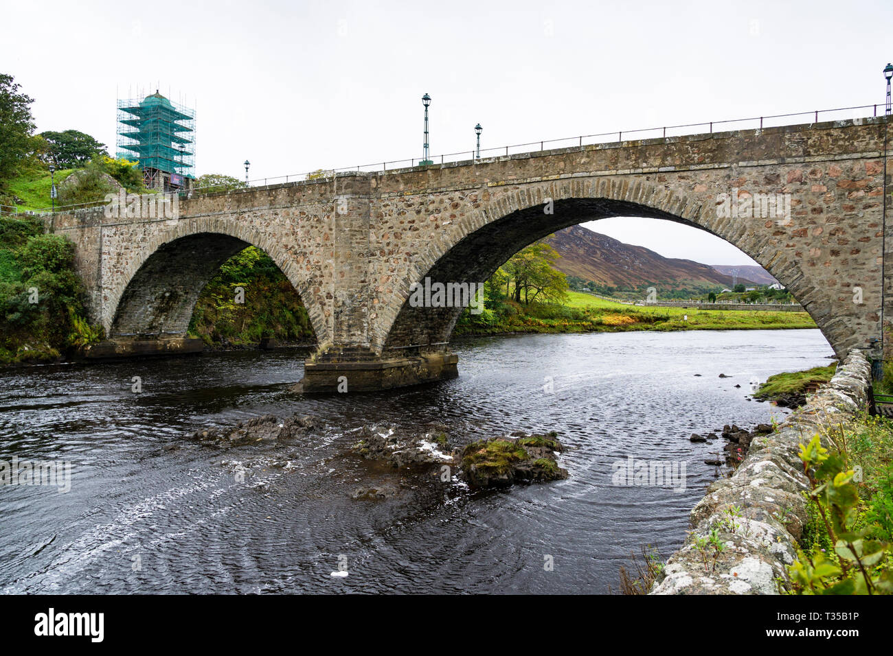 The twin-arched stone masonry bridge in Helmsdale, Scotland Stock Photo ...