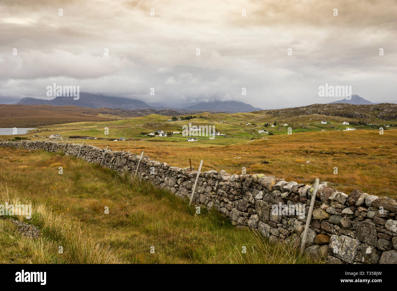 From left to right, mountains Foinaven, Arkle, and Ben Stack are viewed ...