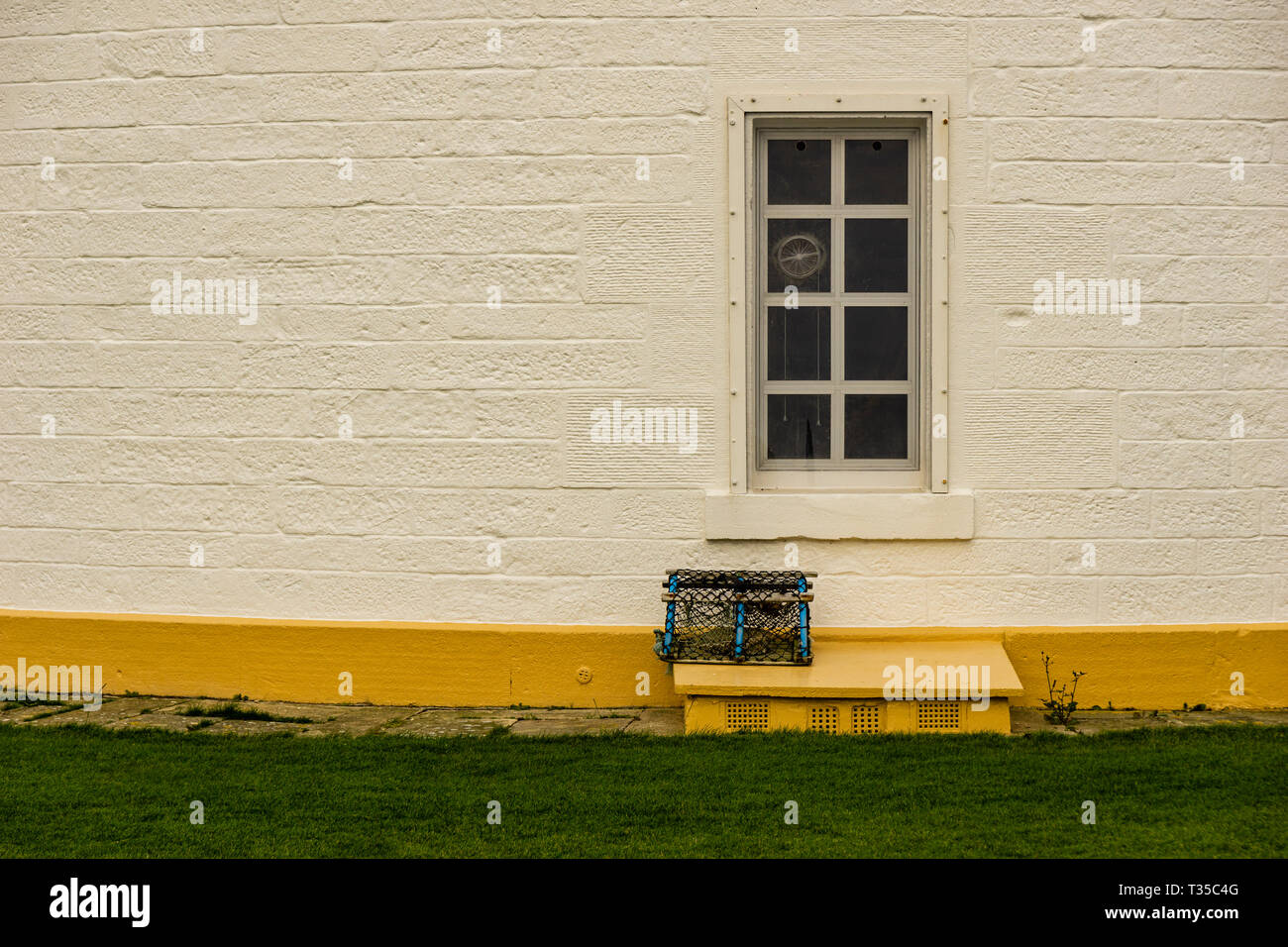 Window in the stone masonry wall of the Tarbat Ness lighthouse ...