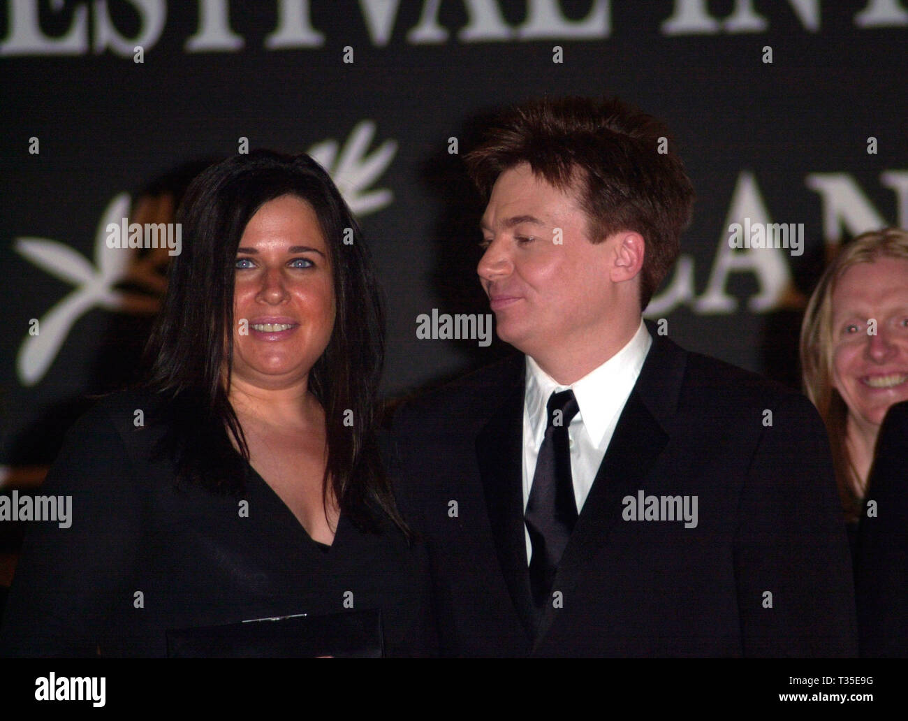 CANNES, FRANCE. May 12, 2001: Actor MIKE MYERS & wife at the premiere ...