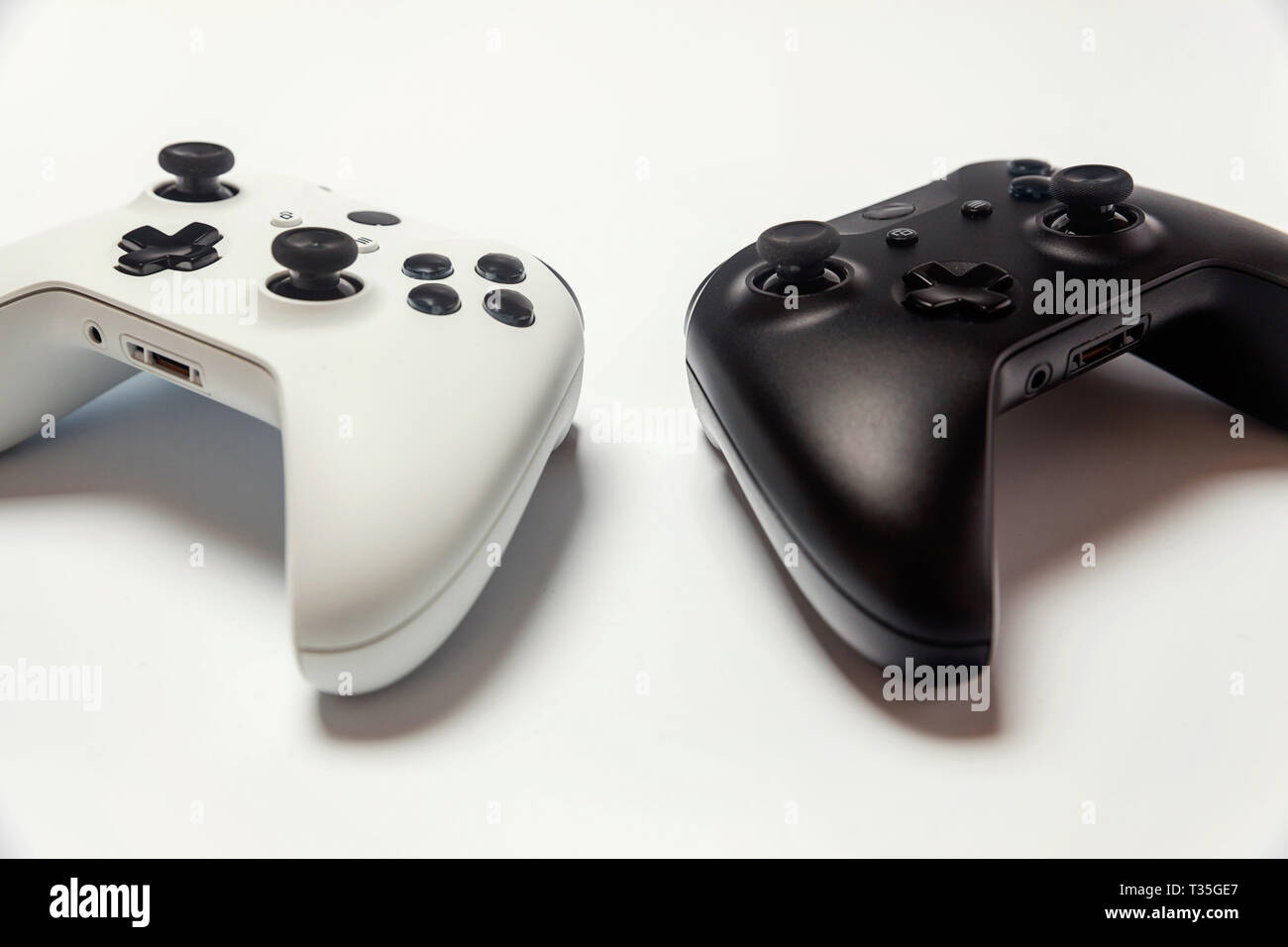 White and black two joystick gamepad, game console isolated on white ...