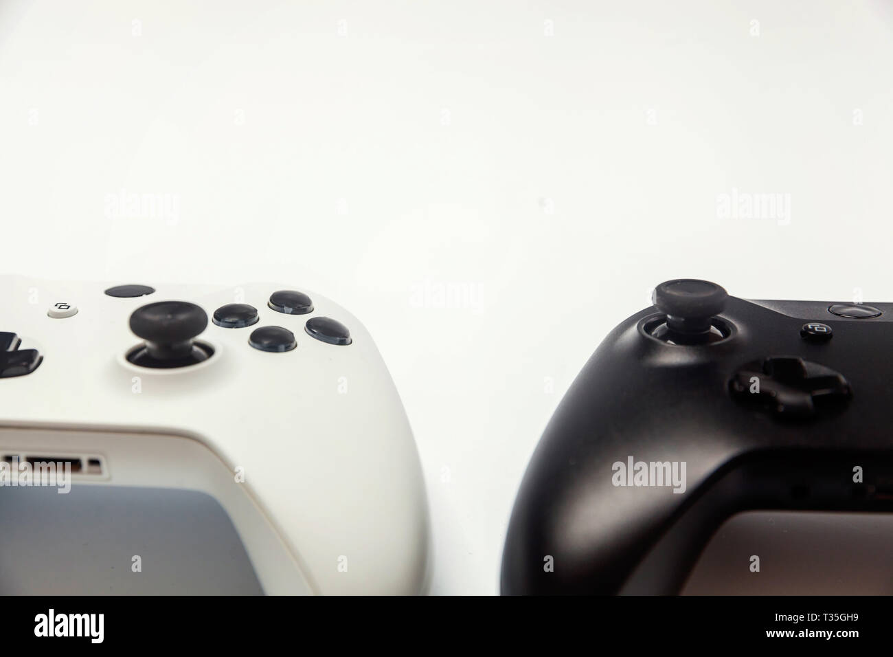 White and black two joystick gamepad, game console isolated on white ...
