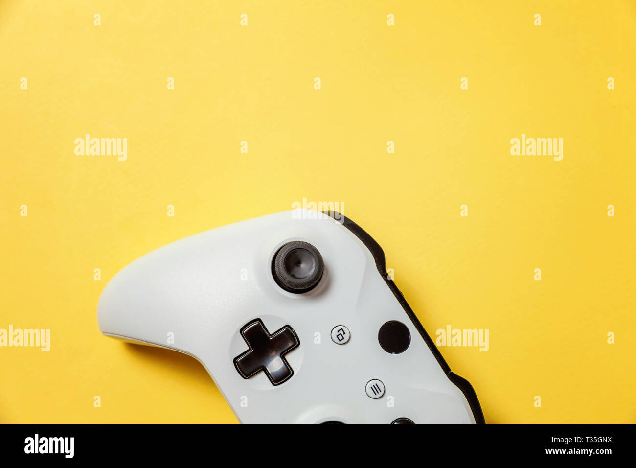 White Joystick Gamepad Game Console On Yellow Colourful Trendy Modern