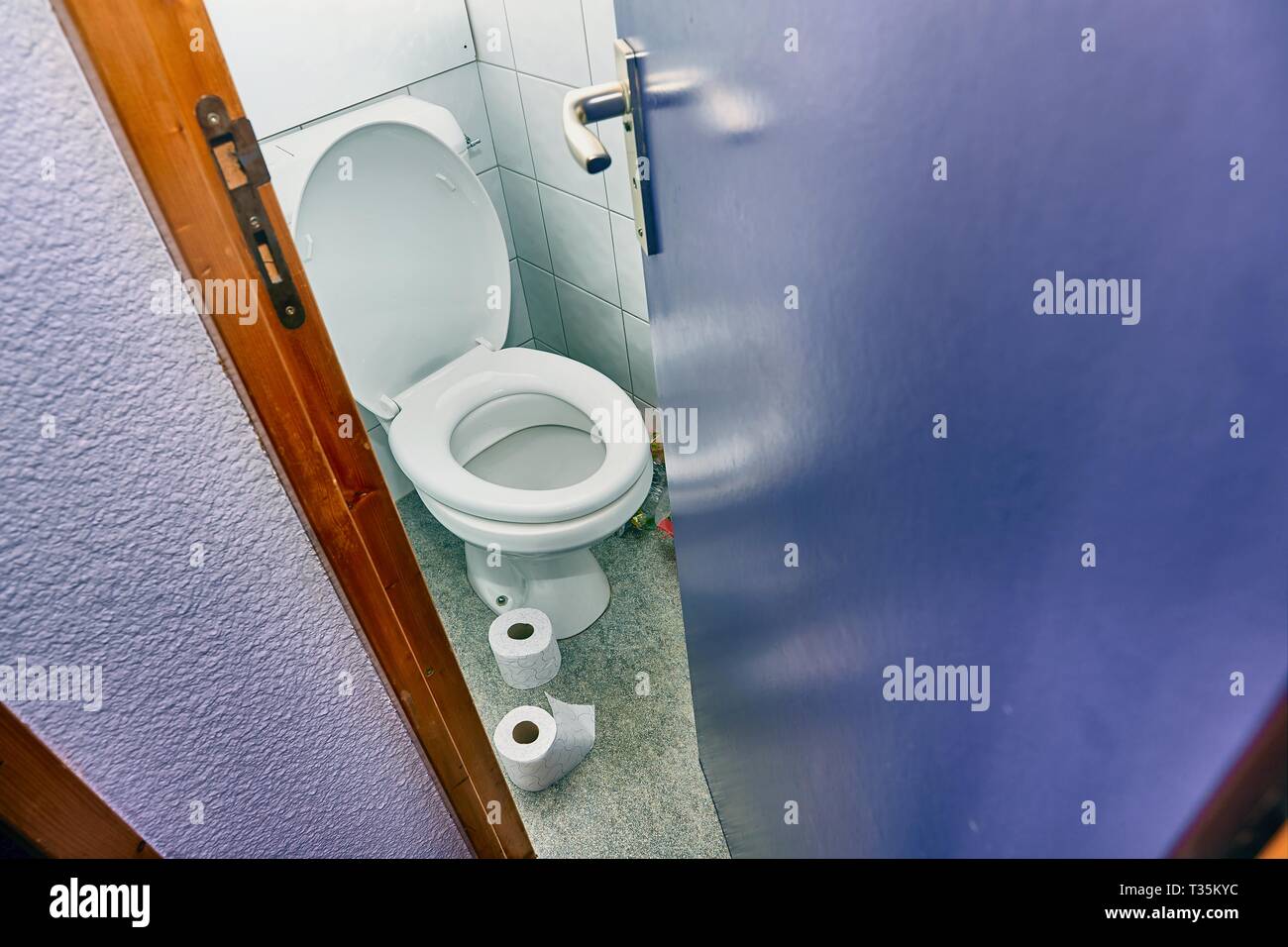 Toilet door opening Stock Photo - Alamy