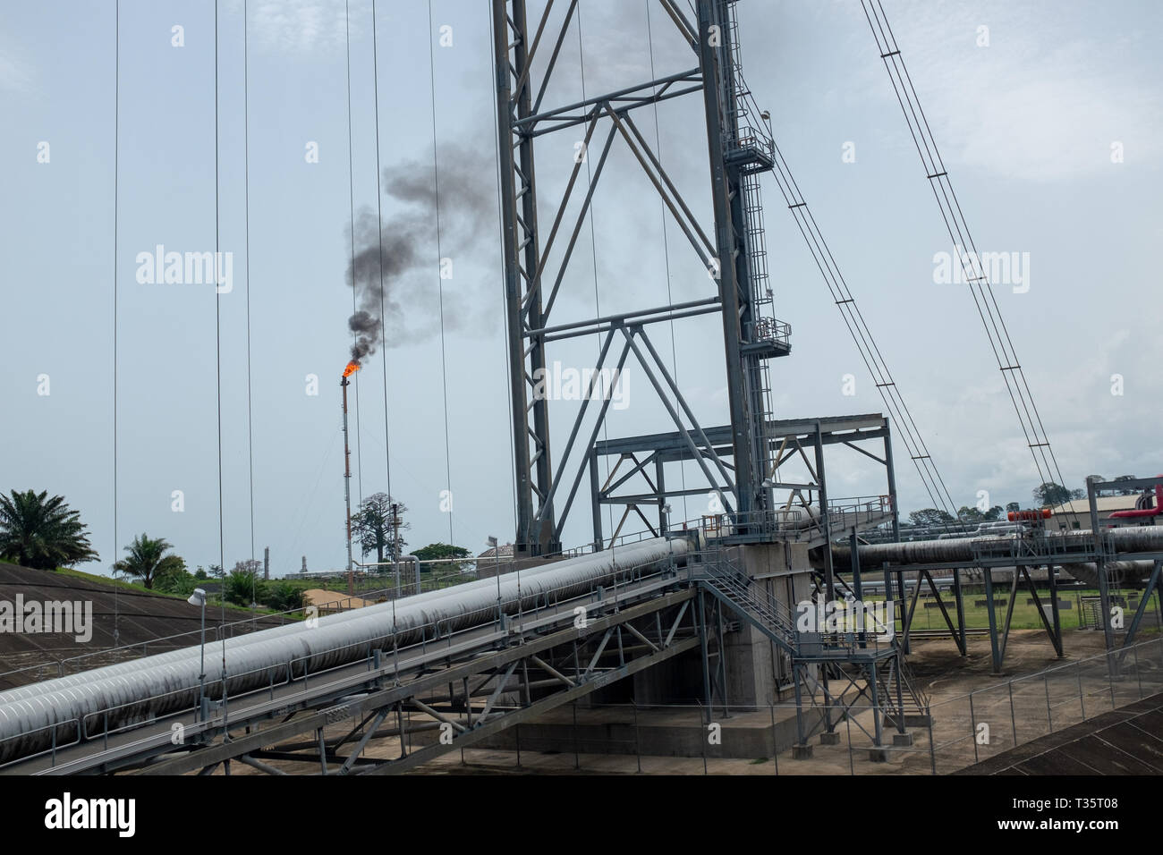Gas burns and flares from an oil and gas facility in Punta Europa ...