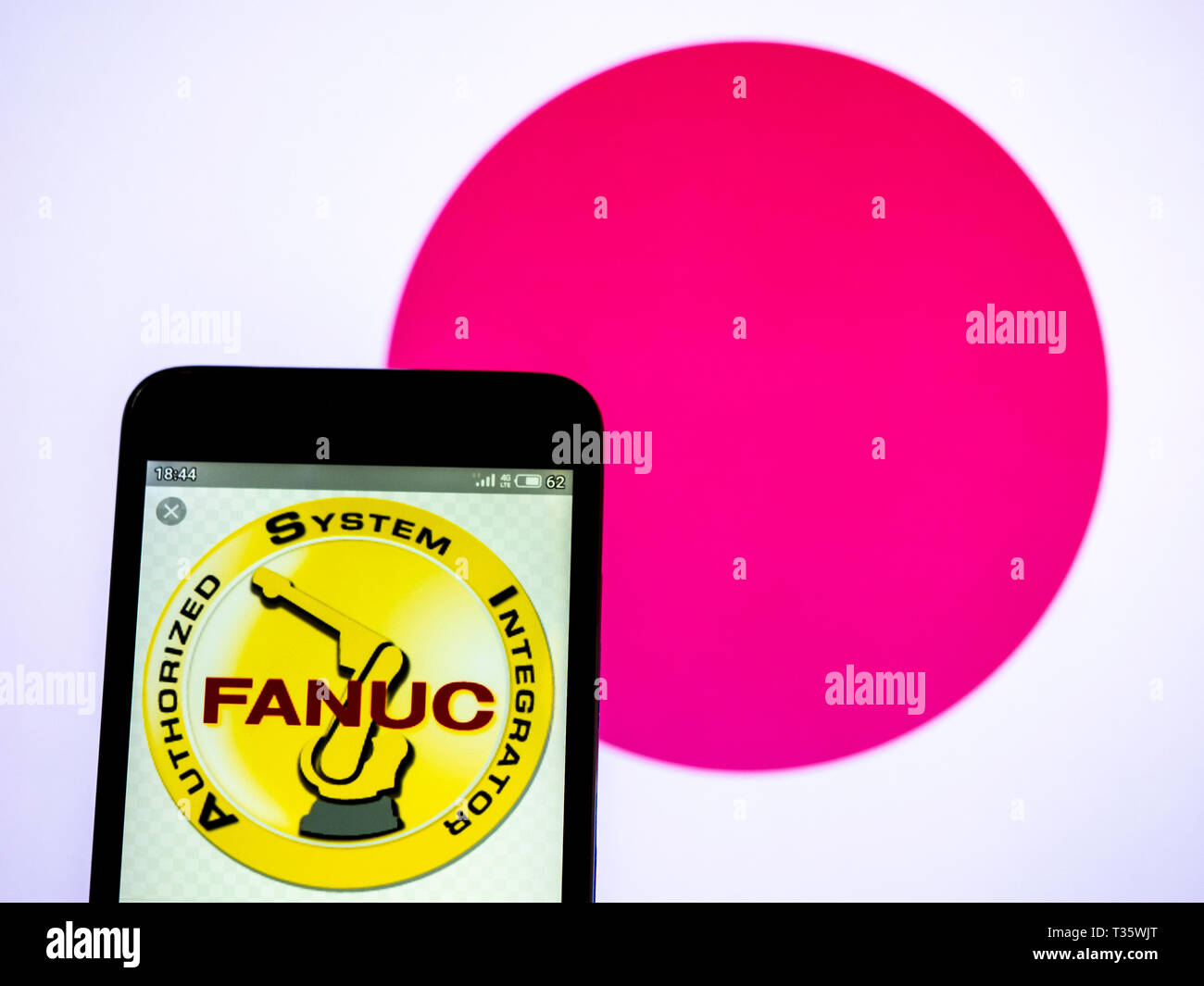 In this photo illustration a FANUC Corporation logo seen displayed on a ...