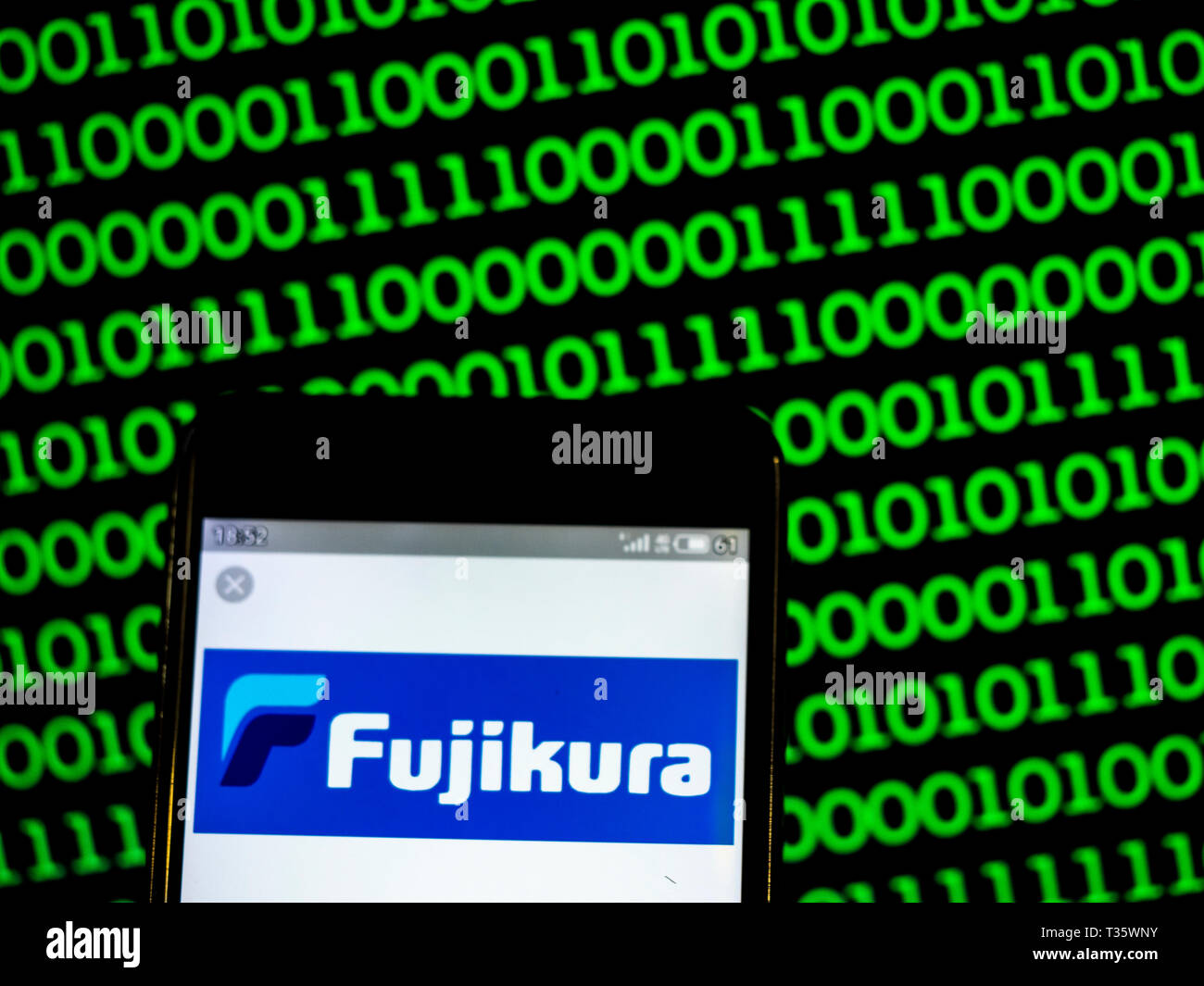 In this photo illustration a Fujikura Ltd. logo seen displayed on a ...