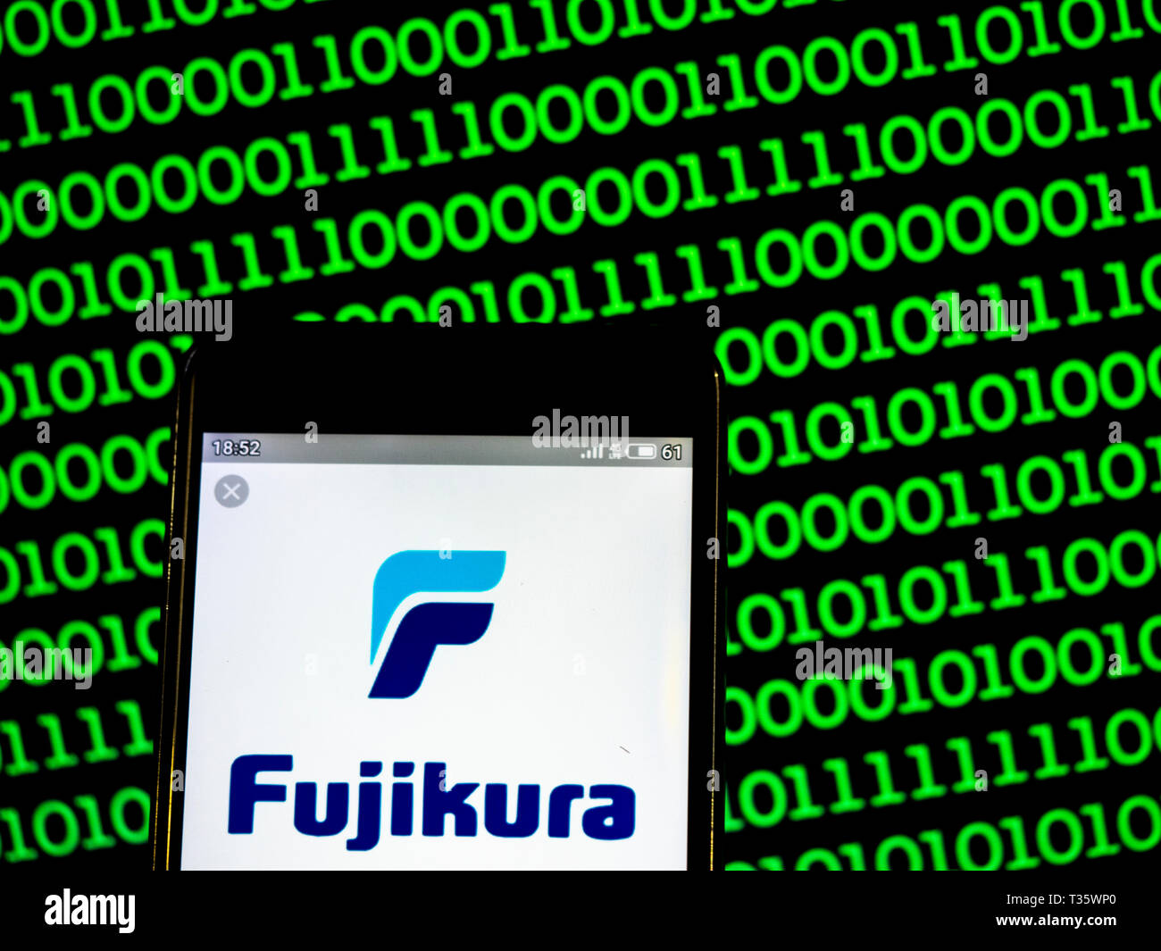 In this photo illustration a Fujikura Ltd. logo seen displayed on a ...