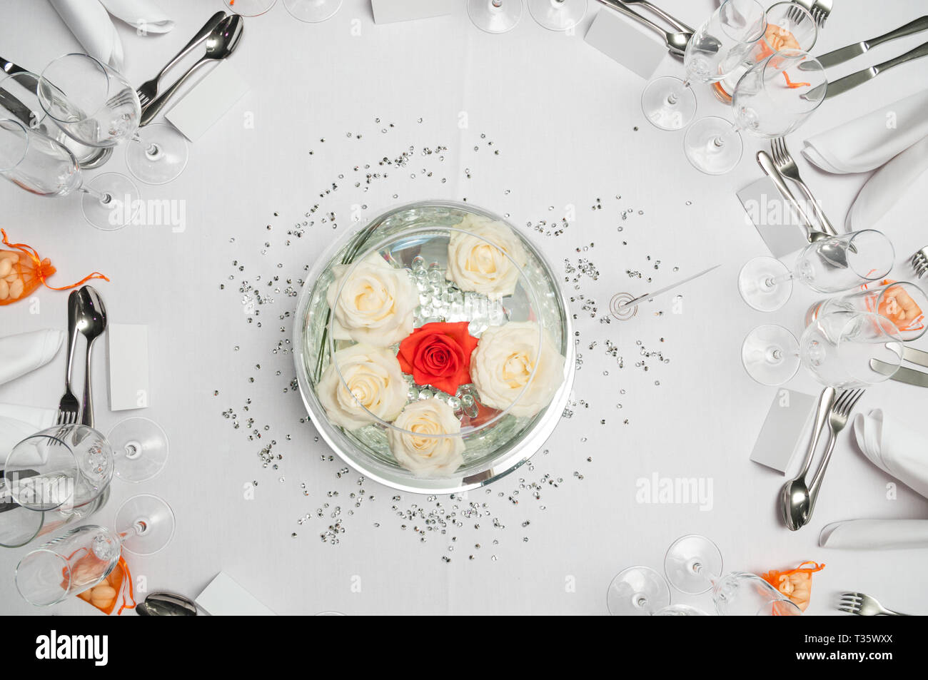 Top view wedding reception table decorated with floral arrangement ...