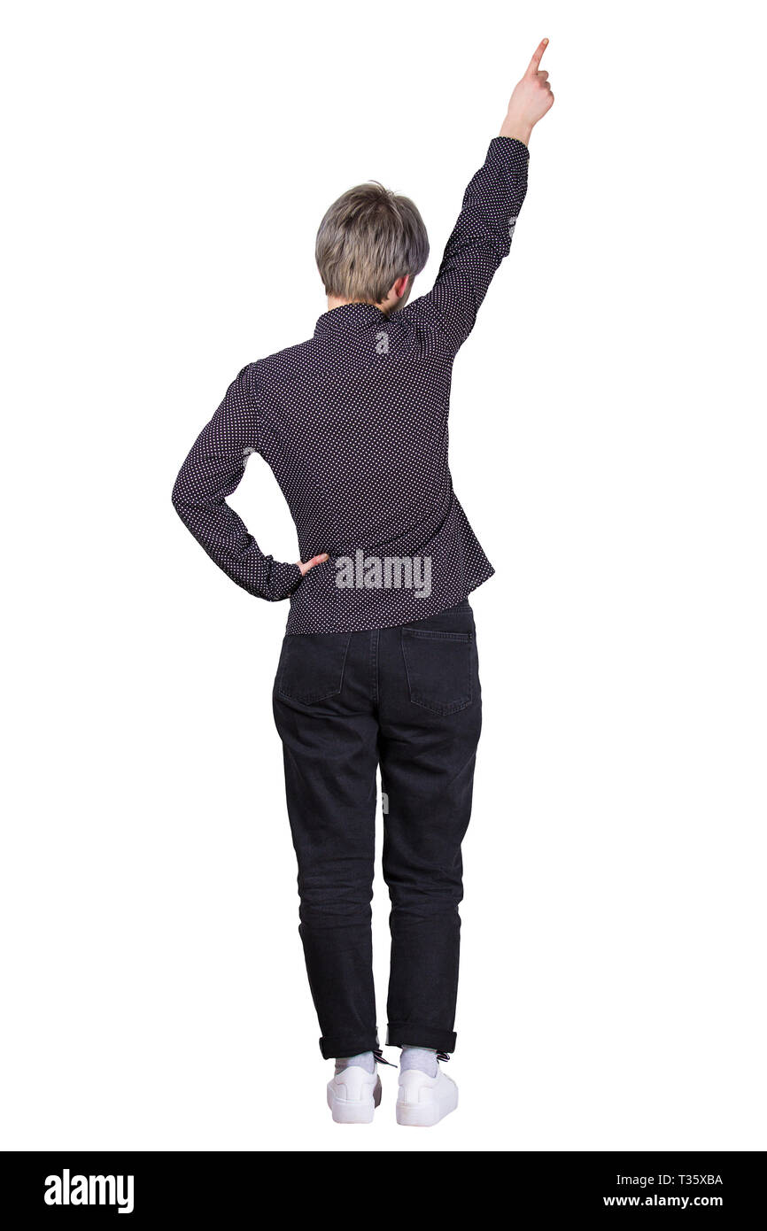 Full Length Rear View Of Young Woman Hipster Raising Arm Pointing