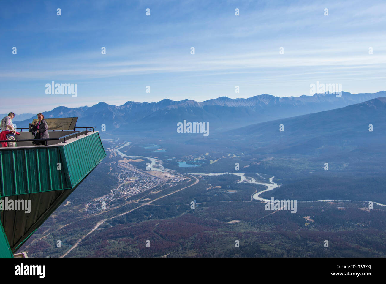 couple on overlook look out over vista of river valley Stock Photo - Alamy