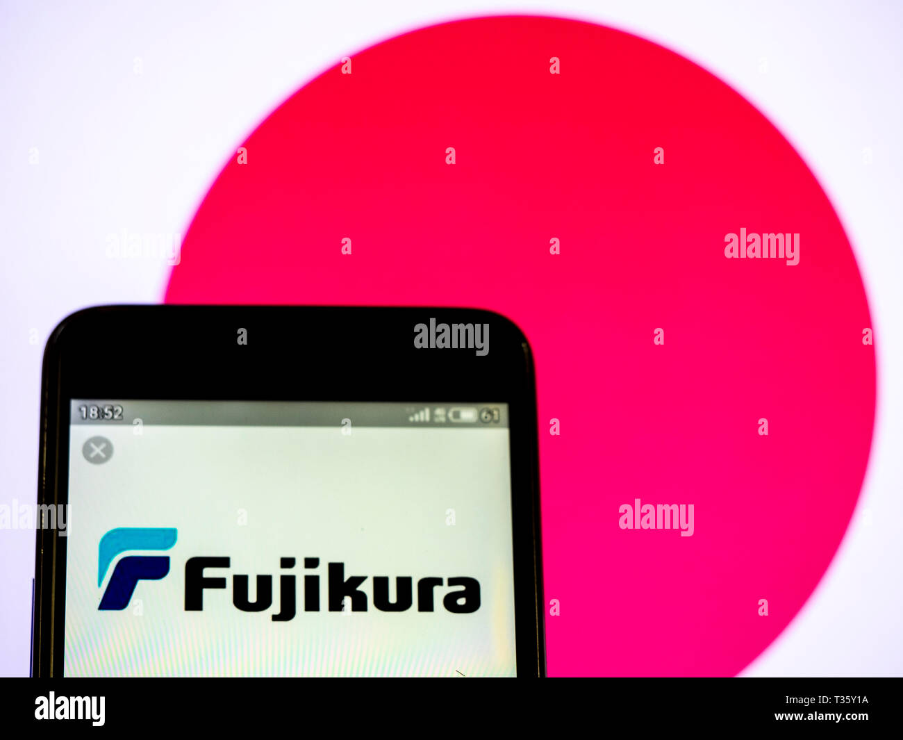 In this photo illustration a Fujikura Ltd. logo seen displayed on a ...