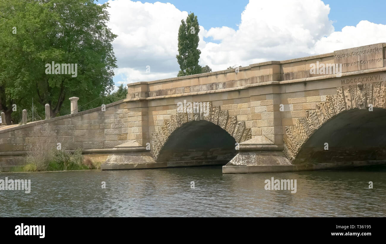 shot of the historic sandstone bridge at ross in tasmania, australia ...