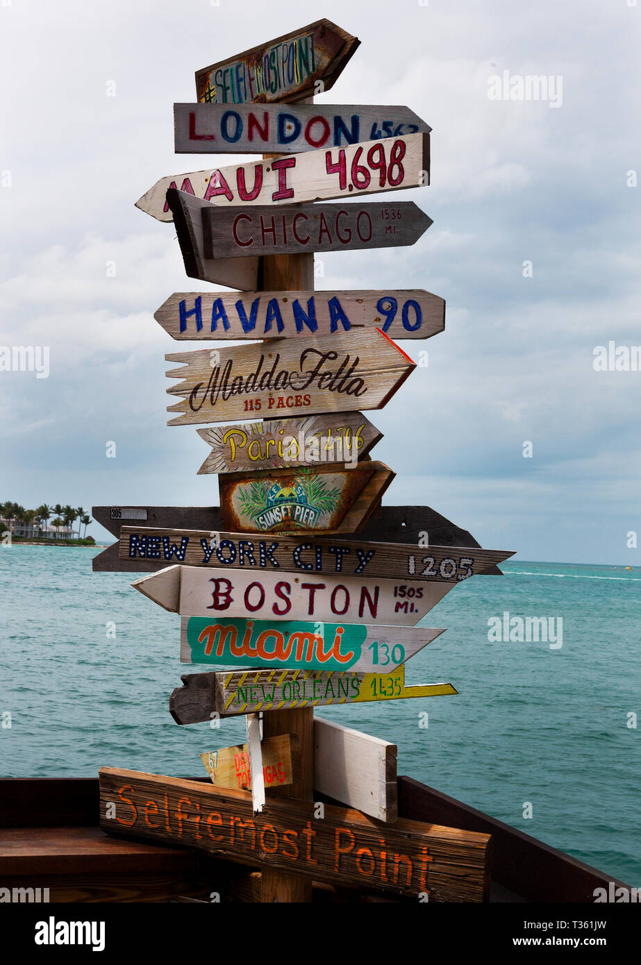 Selfiemost Point distance sign tree at Mallory pier in Key West ...