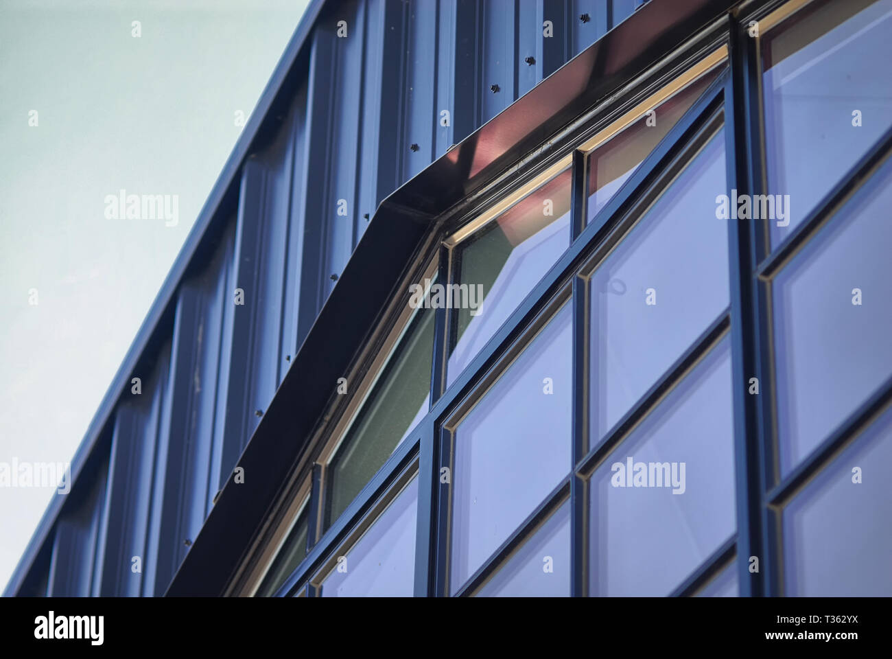 Detail of a modern warehouse with a simple gable roof line Stock Photo ...