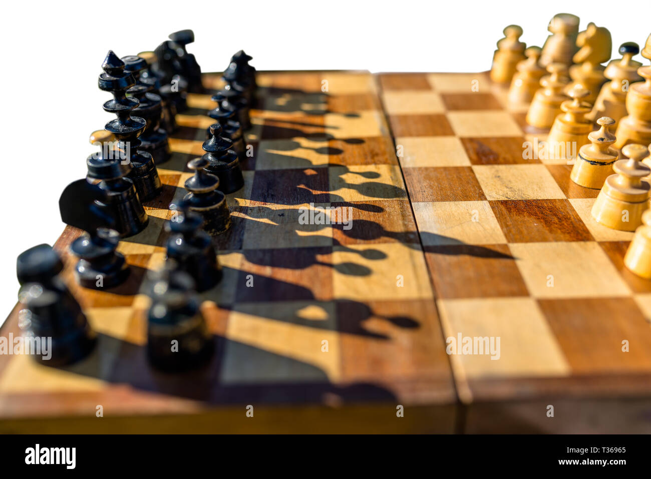 Old chessboard with chess and shadow, isolated on a white background ...