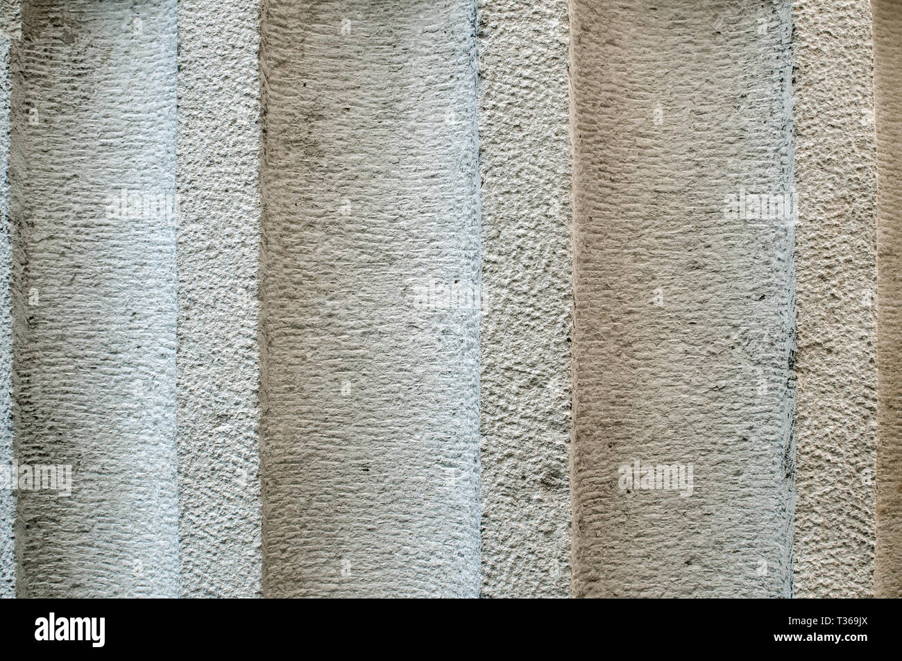 Element of solid stone architectural column closeup as stone background ...