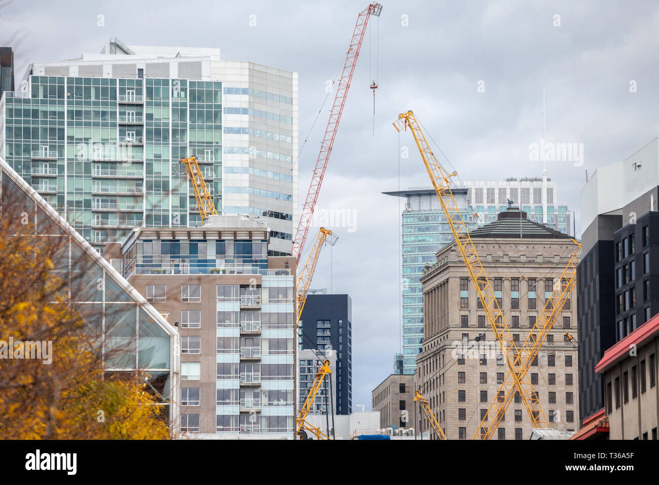 Cranes and building device on a construction site of a skyscraper in ...