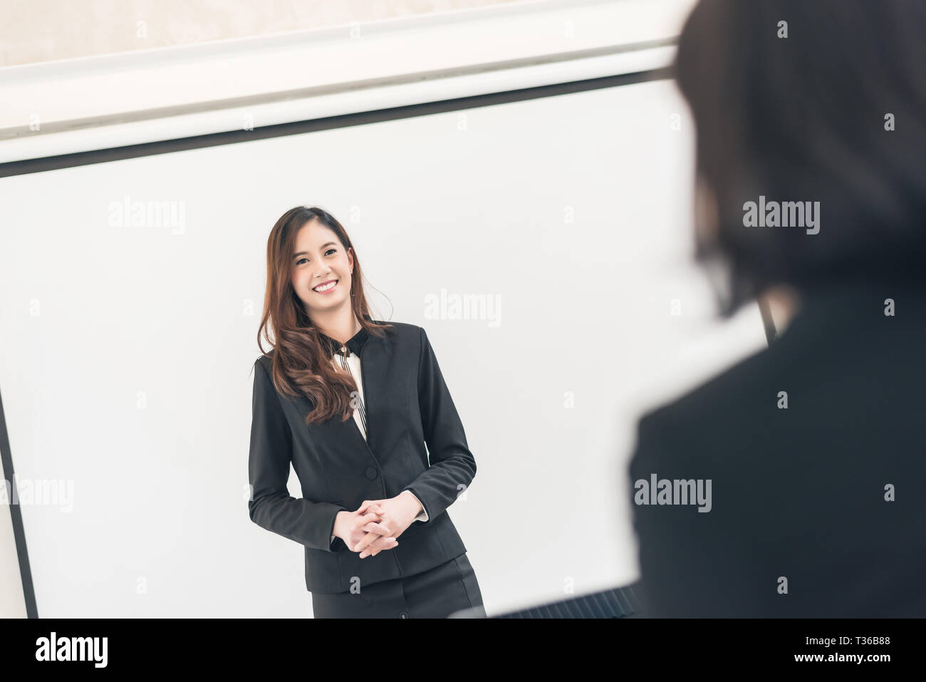 asian business woman introduce at the meeting Stock Photo - Alamy
