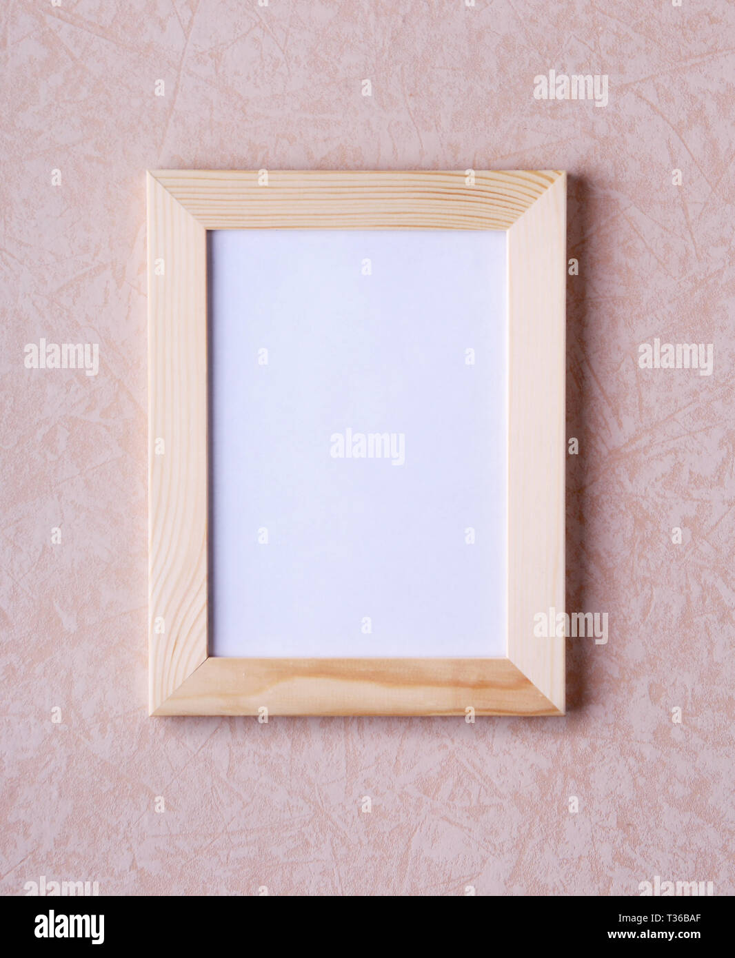 Wood narrow photo frame with mock up space on wall Stock Photo - Alamy