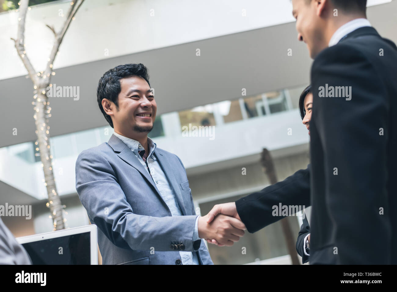 business people shake hand in the outdoor Stock Photo - Alamy
