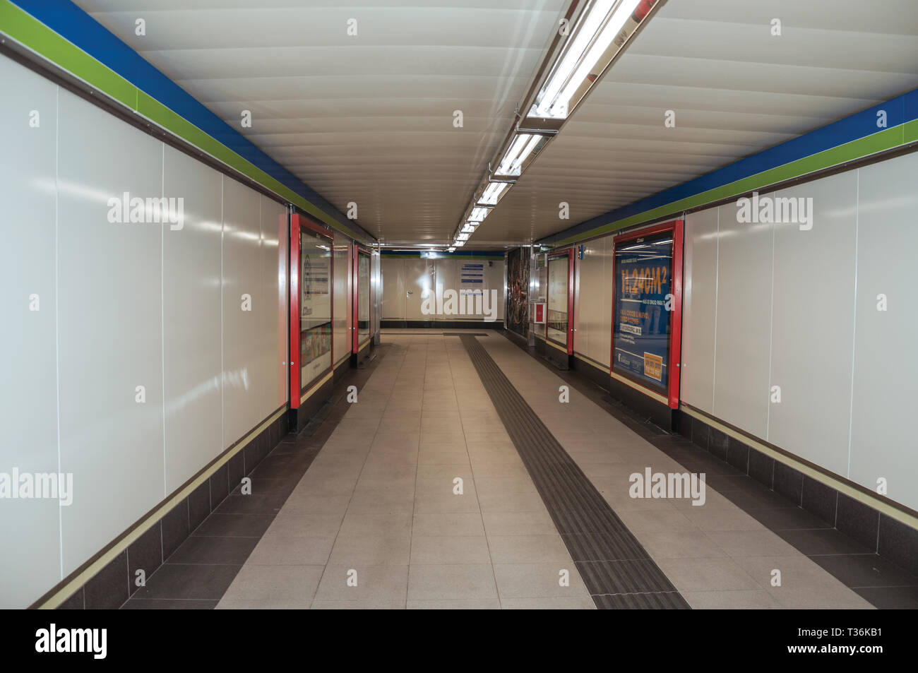 Advertising in passageway linking modern stations at the Madrid Subway ...