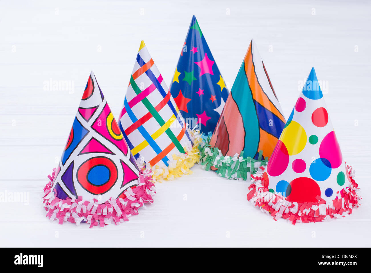 Group of colorful party hats. Six different Birthday party hats on ...