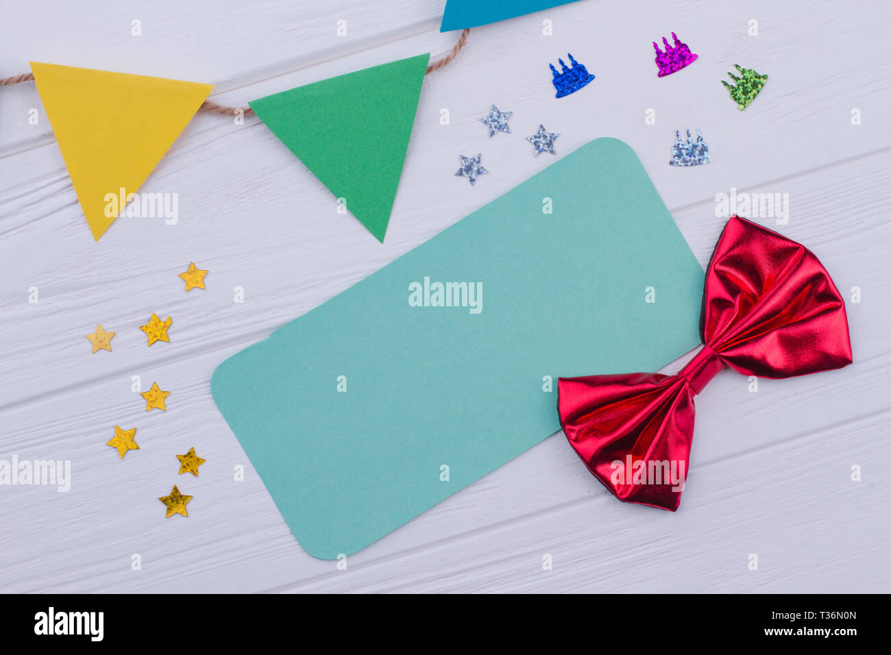 Birthday accessories on white wooden background. Birthday party items ...