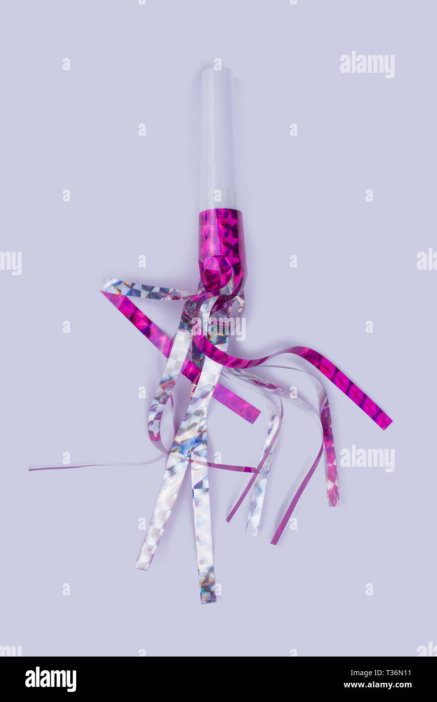 Birthday whistle isolated on a white. Glitter fringed metalic ...