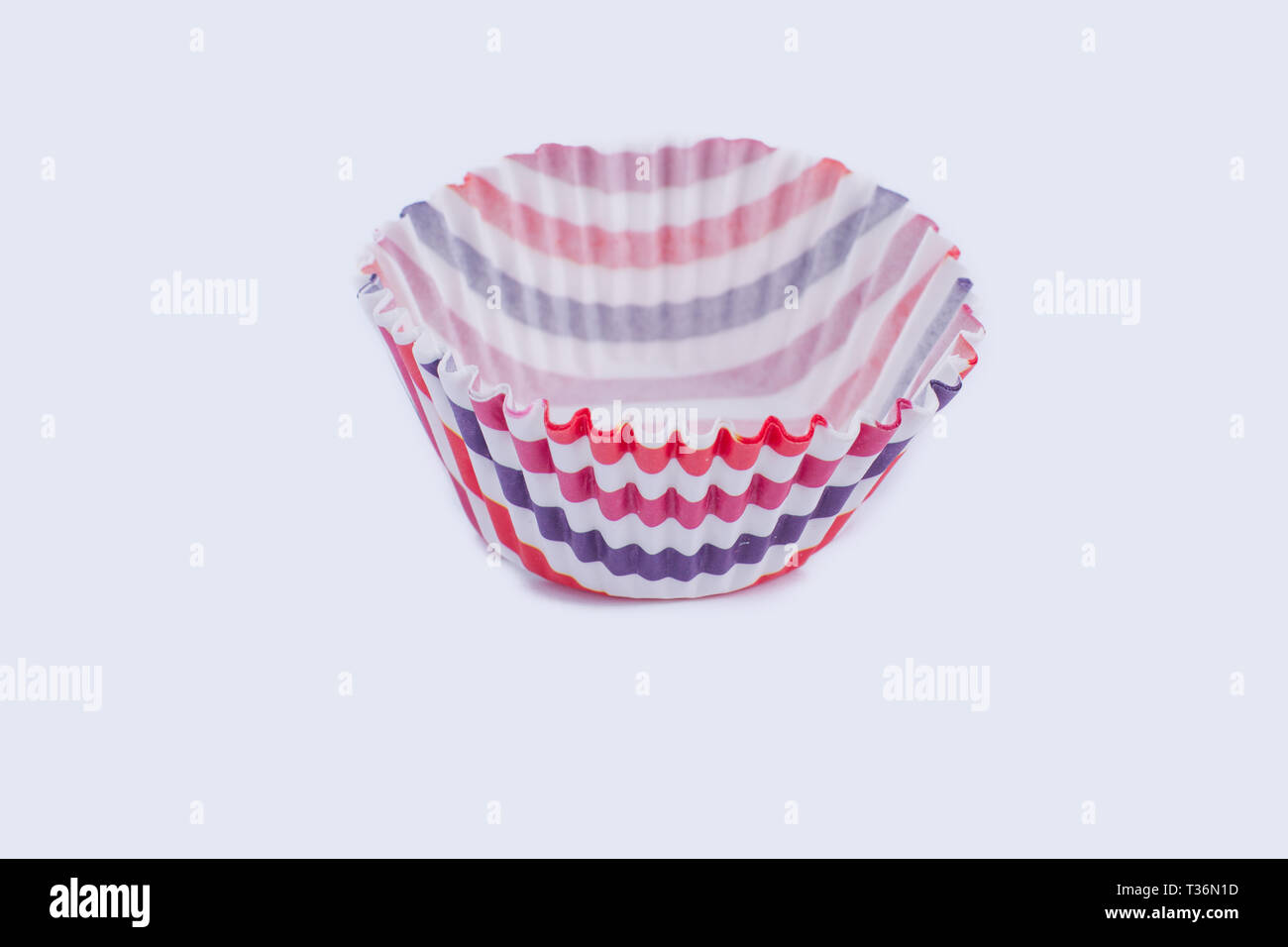 Paper form for cupcake on white background. Empty cupcake mold, studio ...