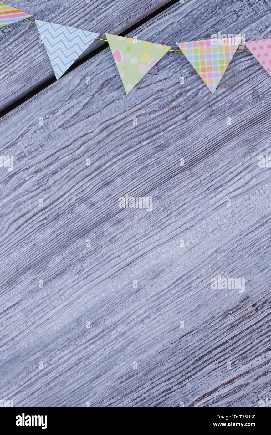 Paper party flags for decoration. Festive background with paper flags ...