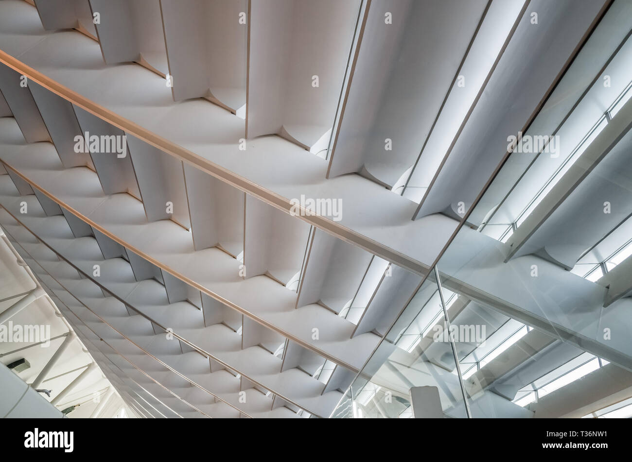 geometric ceiling and the channel of building inside the airport of ...