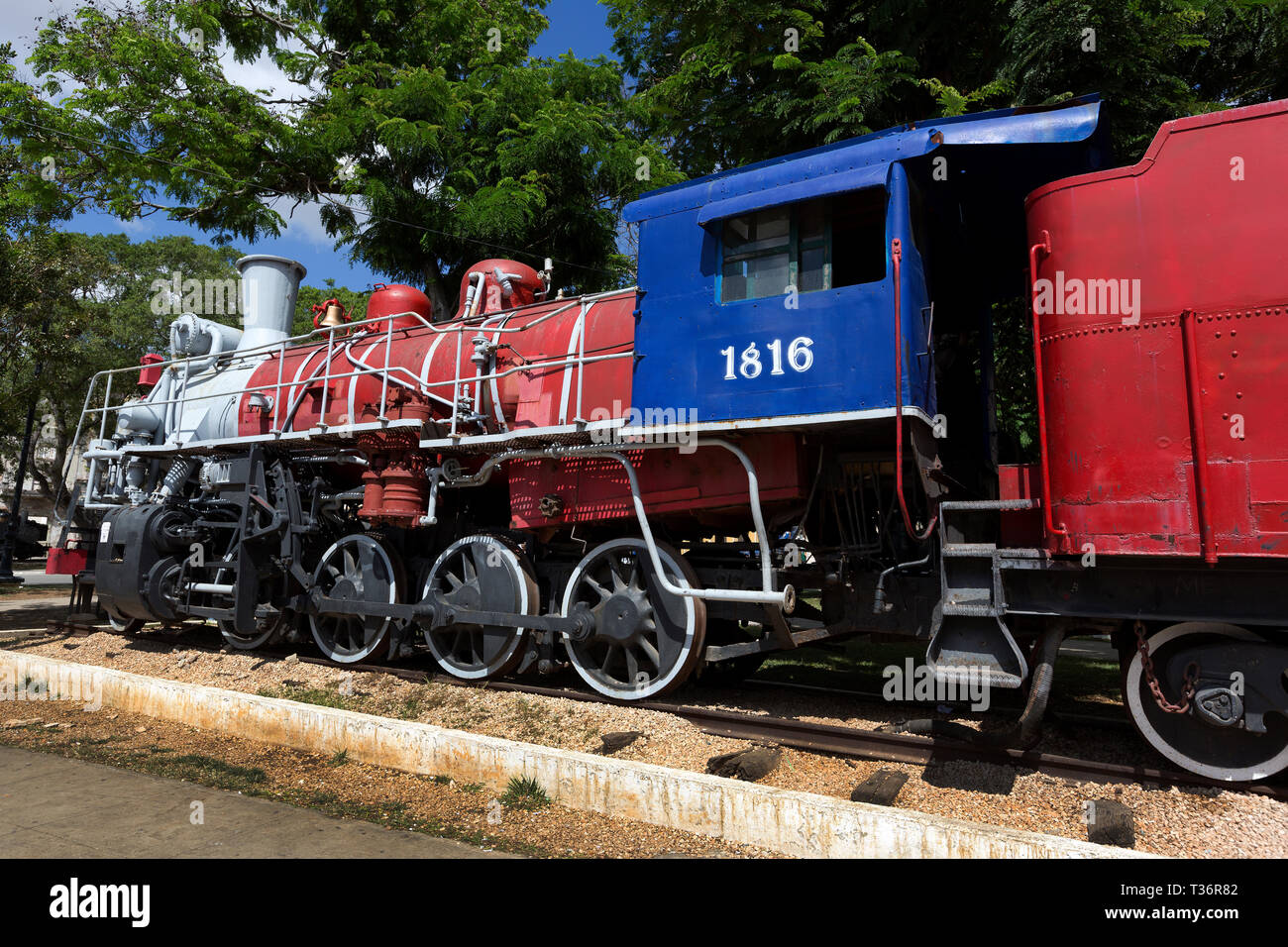 Red and blue train engine #1816 on display at the train station park in ...