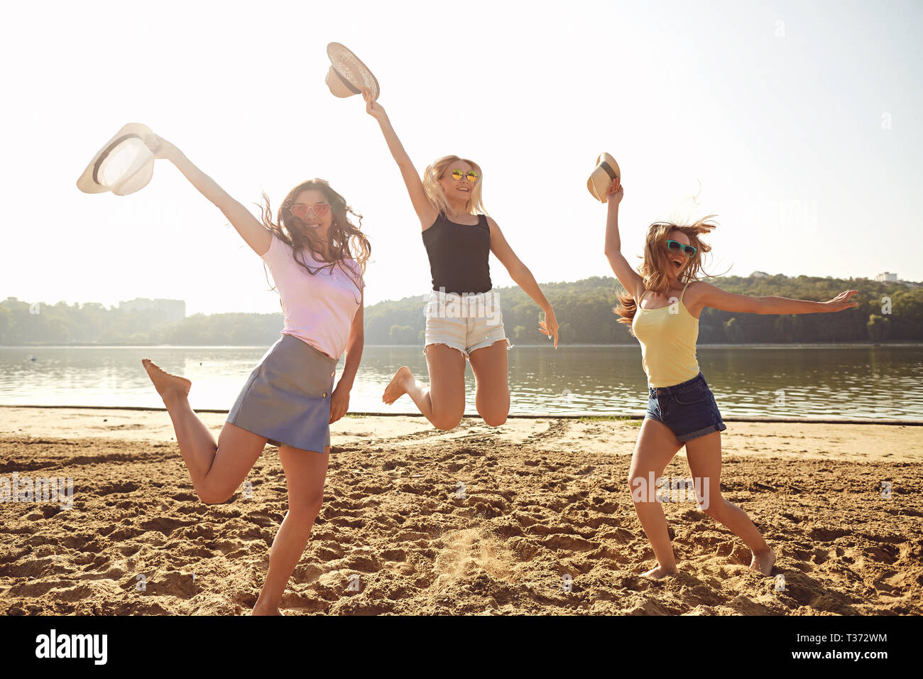 Laughing at the beach hi-res stock photography and images - Alamy
