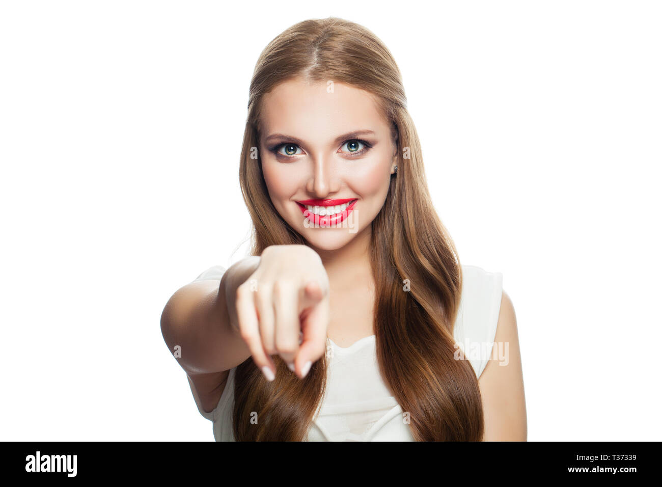 Happy woman model pointing forward isolated on white, portrait Stock ...