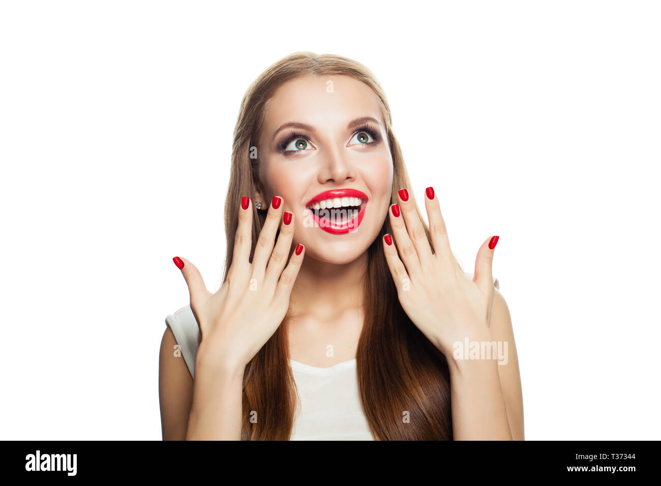Surprised excited model isolated on white background. Laughing woman ...