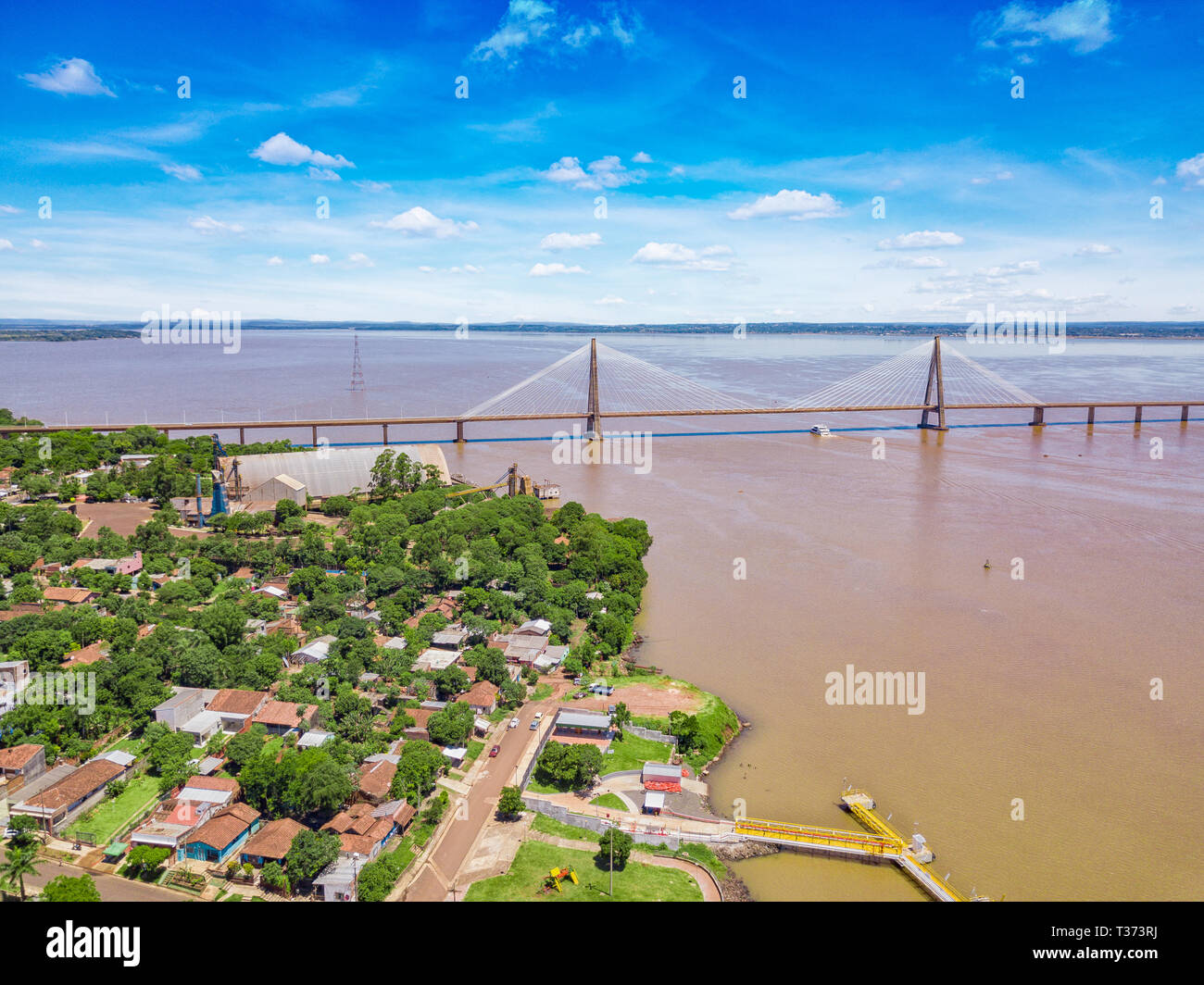 Aerial view of Encarnacion in Paraguay overlooking the bridge to ...