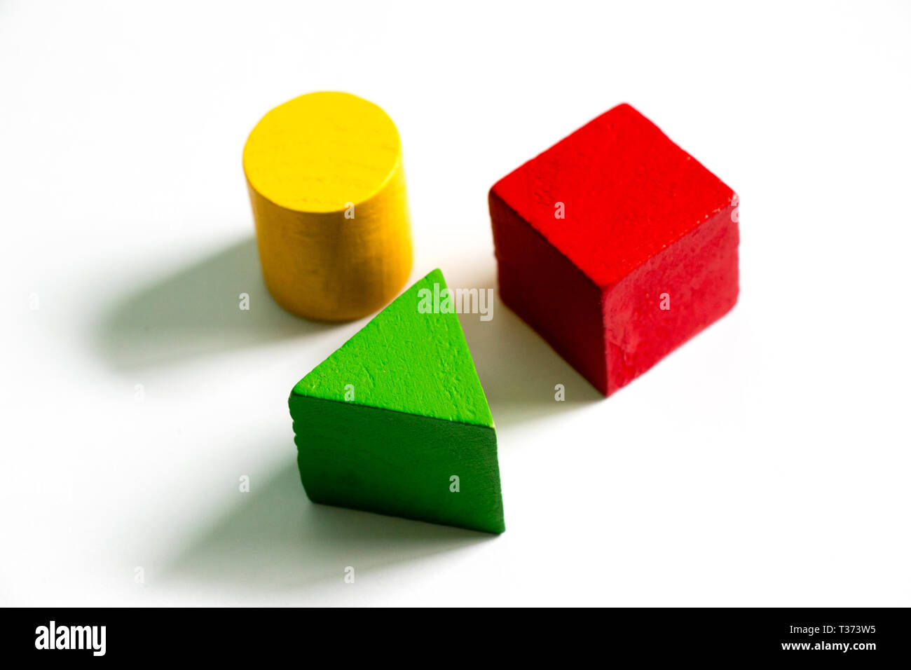 Set of colorful wooden shape toy (Square, triangle, round) on white ...