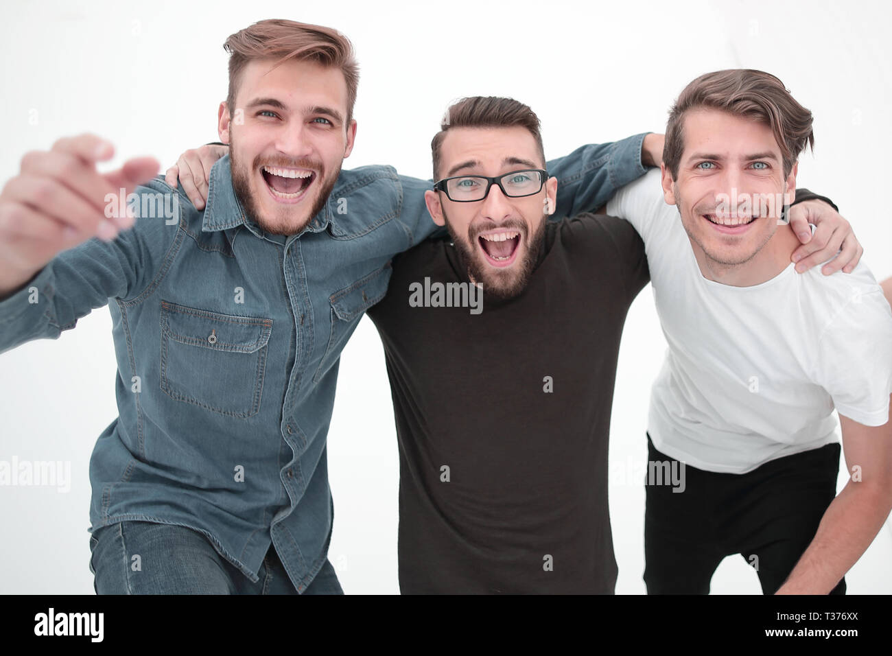 Four guy friends standing hi-res stock photography and images - Alamy