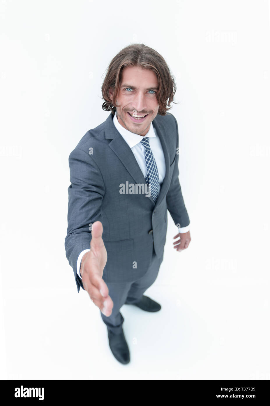 Business man offer and give hand for handshake Stock Photo - Alamy