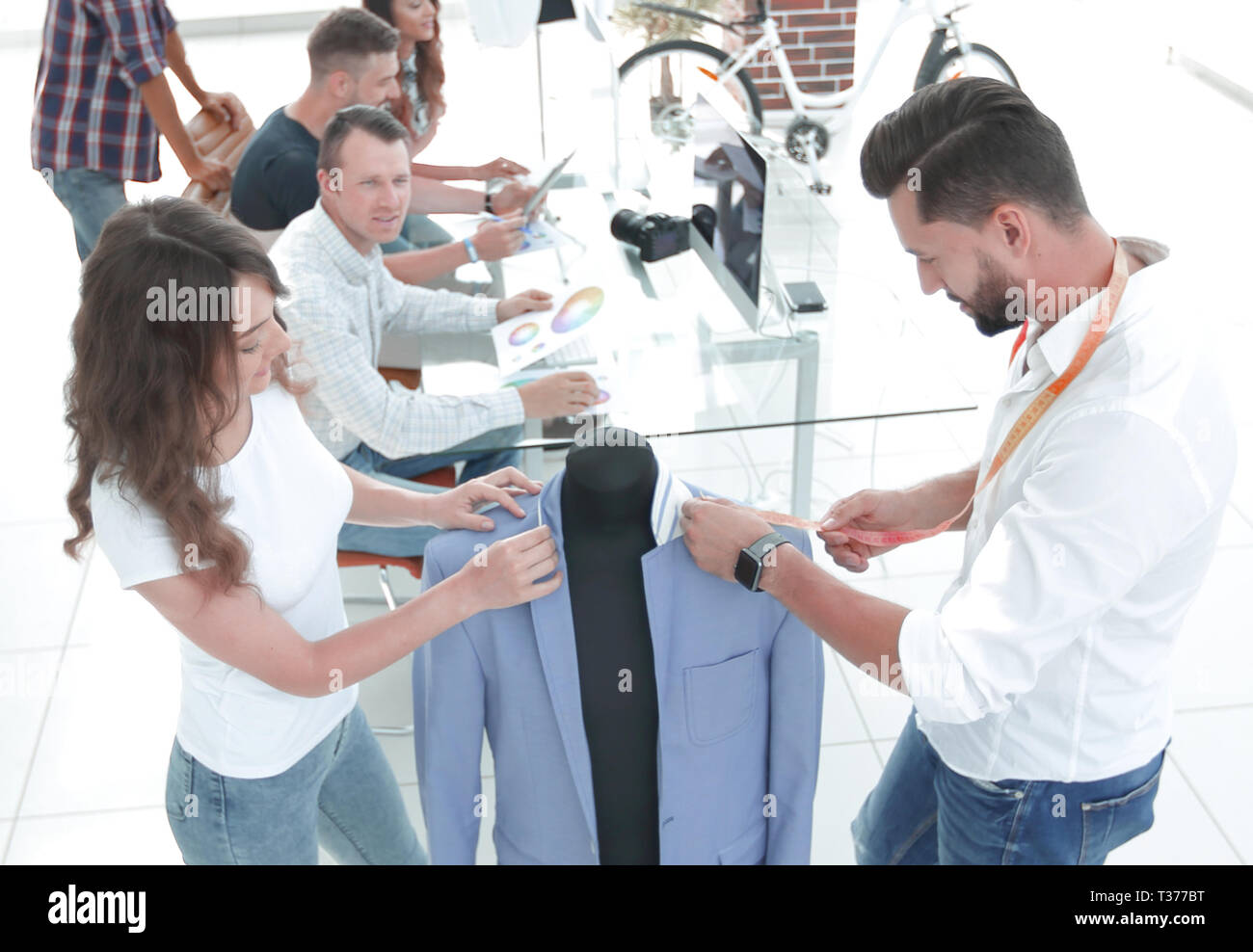 designers working on new models of clothes Stock Photo - Alamy