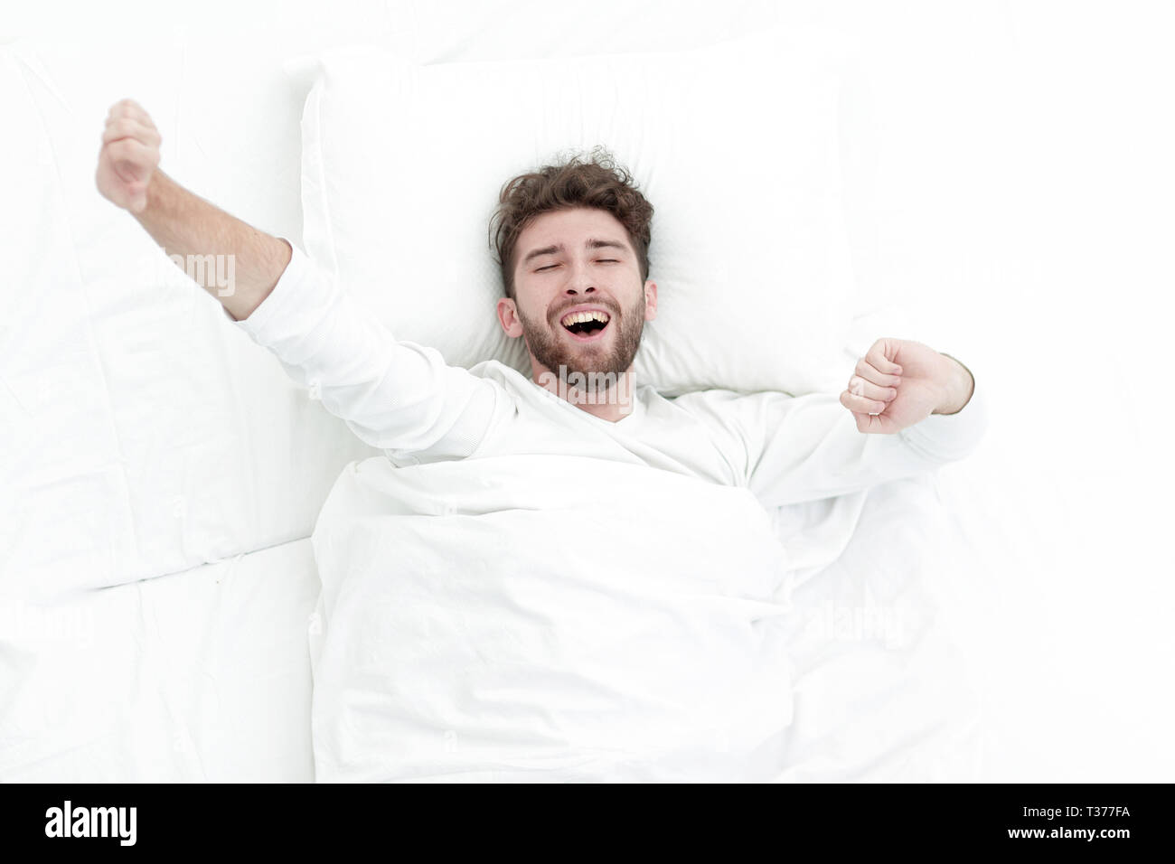 Handsome guy waking up Cut Out Stock Images & Pictures - Alamy