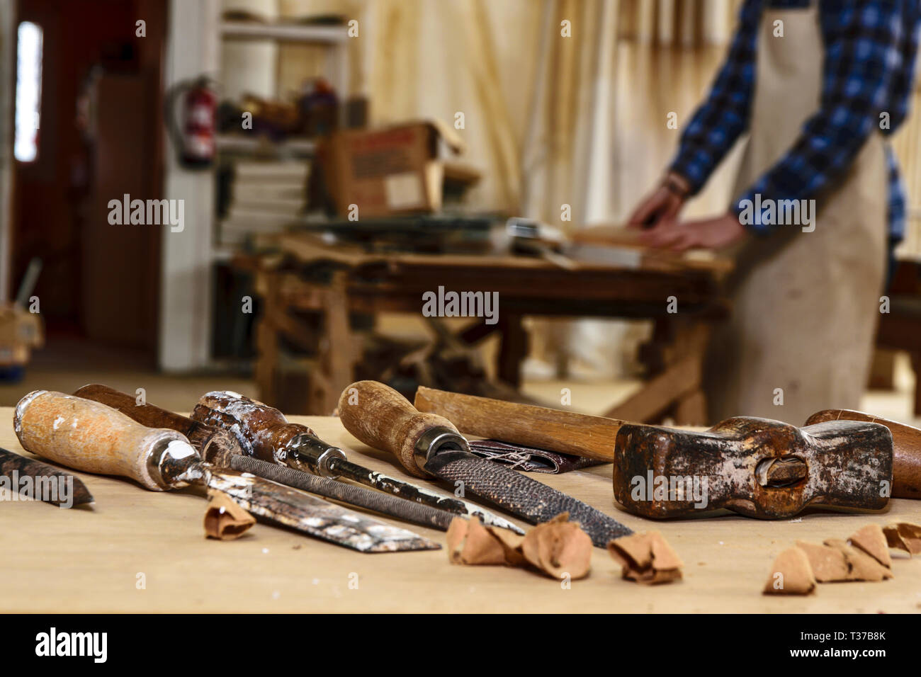 Blurred background of carpentry workshop. Machinery background and ...