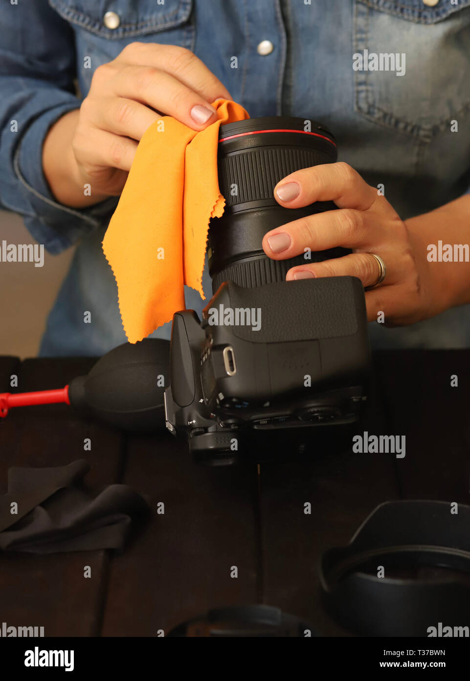 Cleaning camera lens hi-res stock photography and images - Alamy