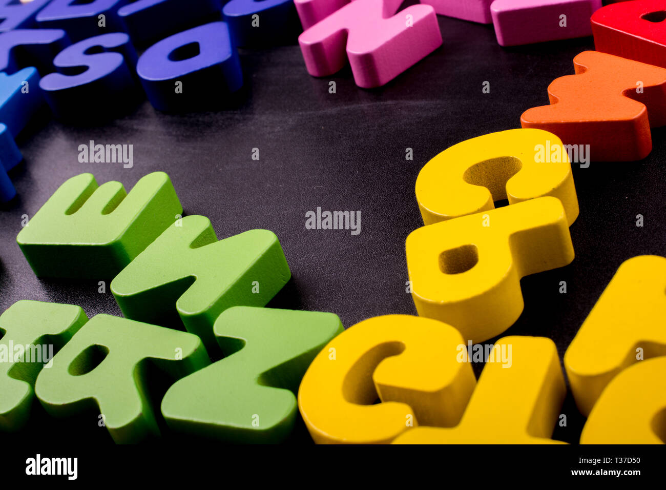 Colorful Letters of Alphabet made of wood Stock Photo - Alamy