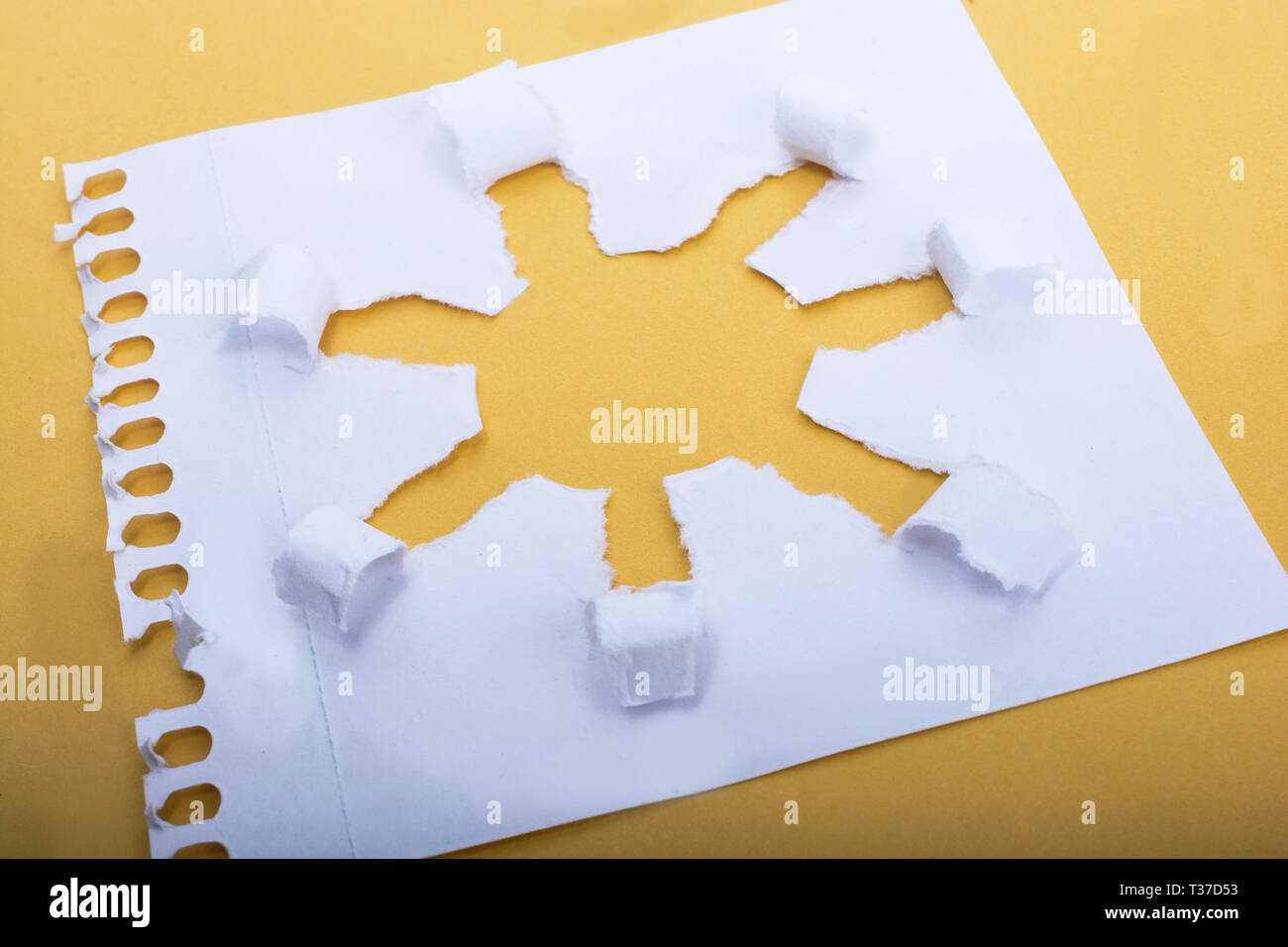 Sun shape made through torn paper in white background Stock Photo - Alamy