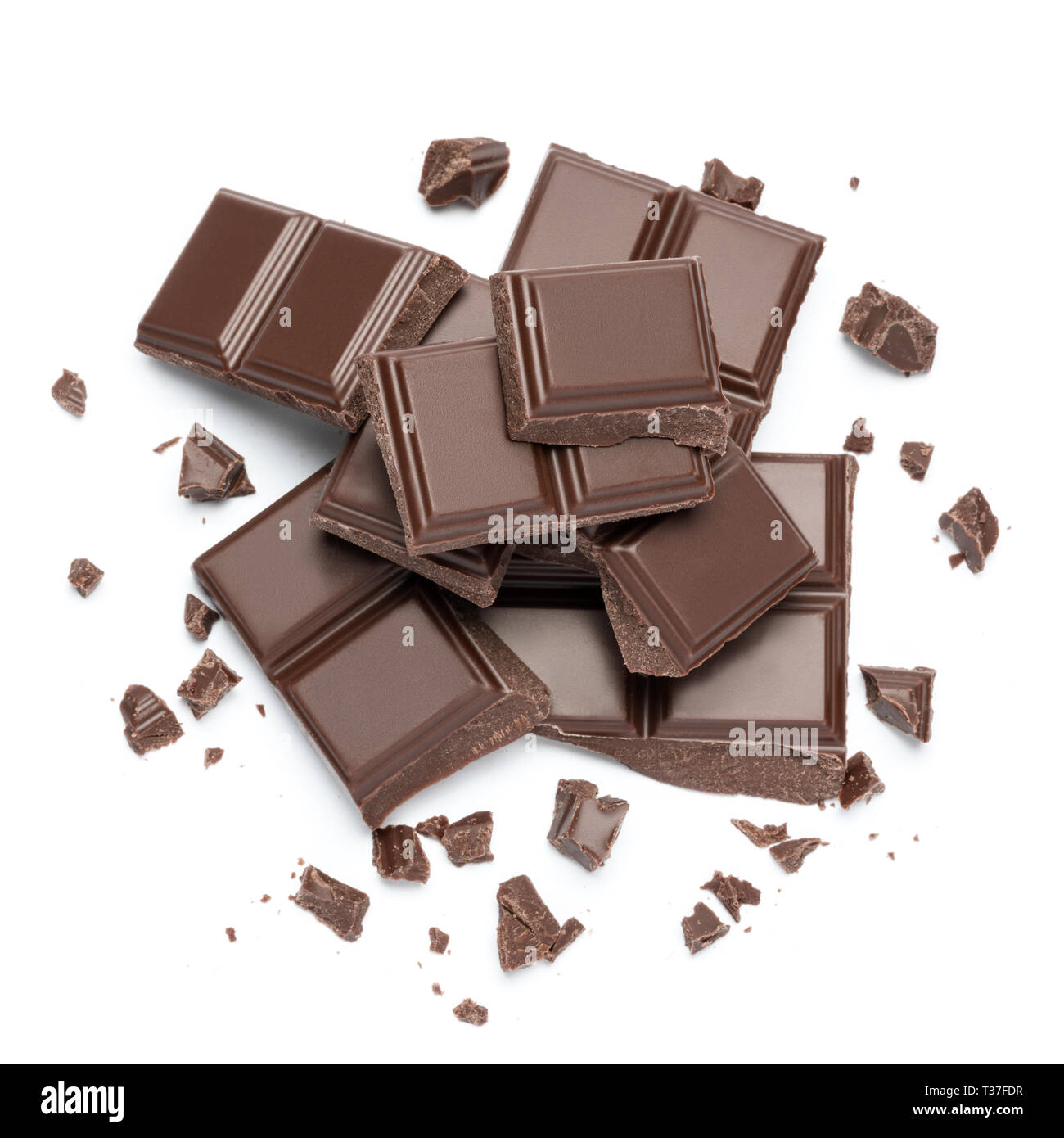 Dark organic chocolate pieces isolated on white background Stock Photo ...