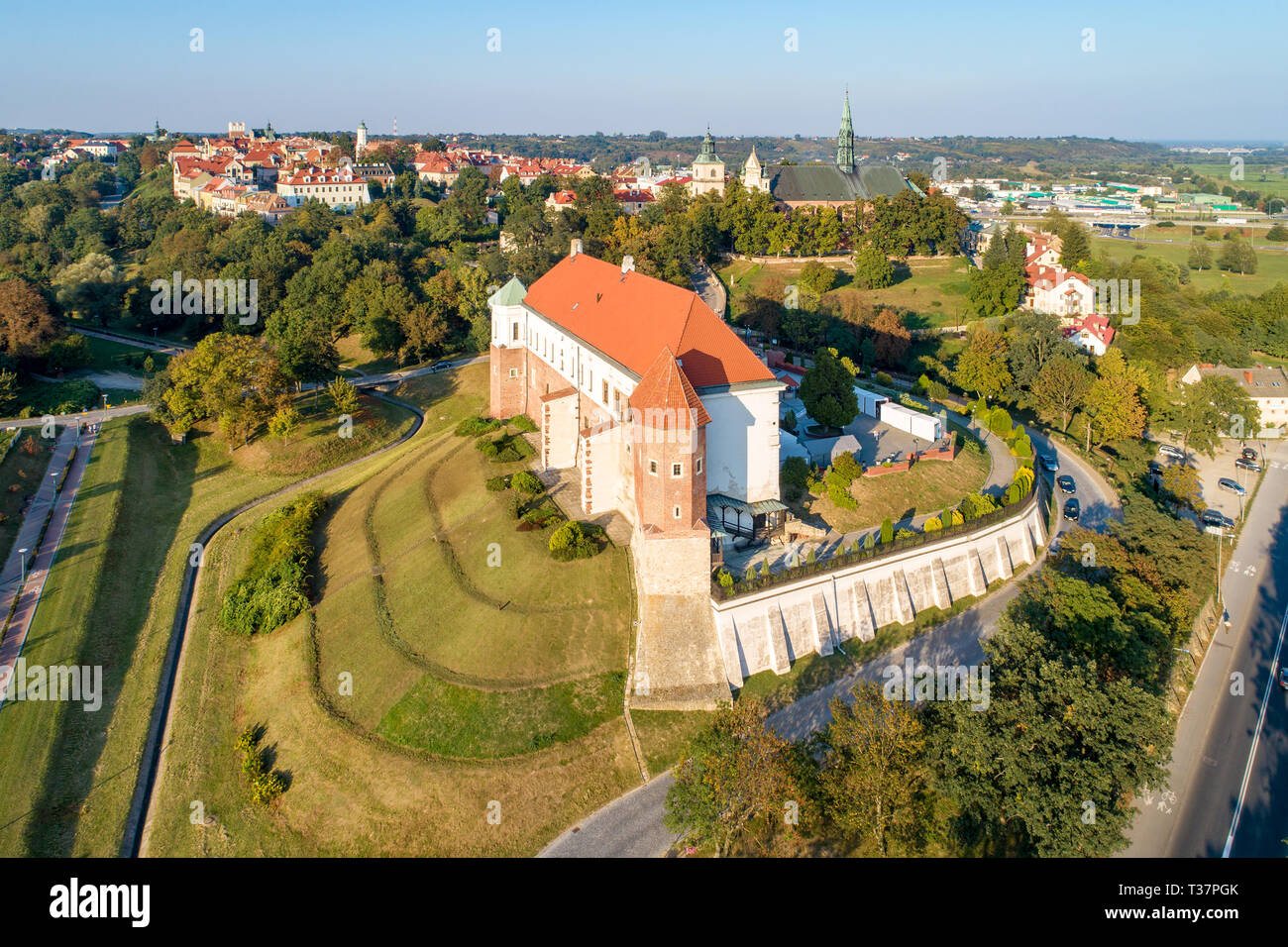 Sandomierz, Poland. Medieval castle in front, old town with town hall ...