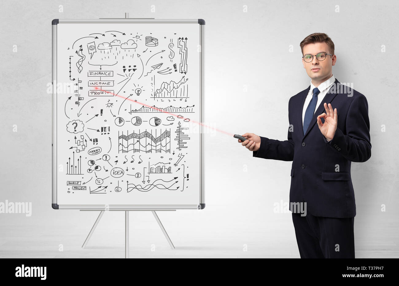 Professor with laser pointer teaching business theories Stock Photo - Alamy