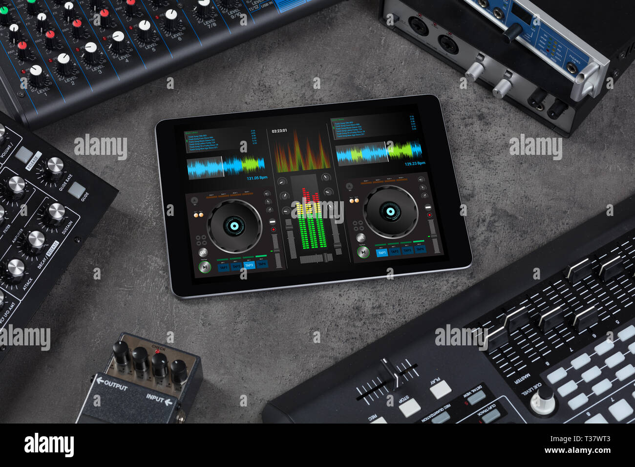 Mixing music on tablet with electronic music instruments concept Stock ...